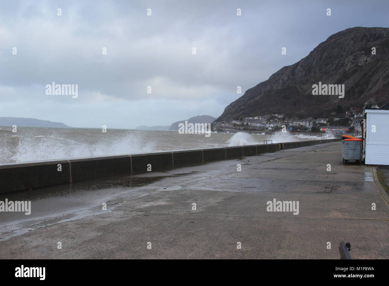 High winds and rough seas bring huge waves crashing in to the sea ...