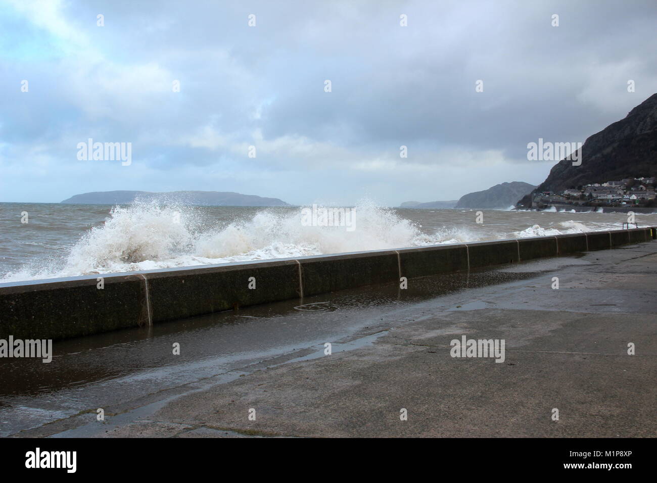 High winds and rough seas bring huge waves crashing in to the sea ...