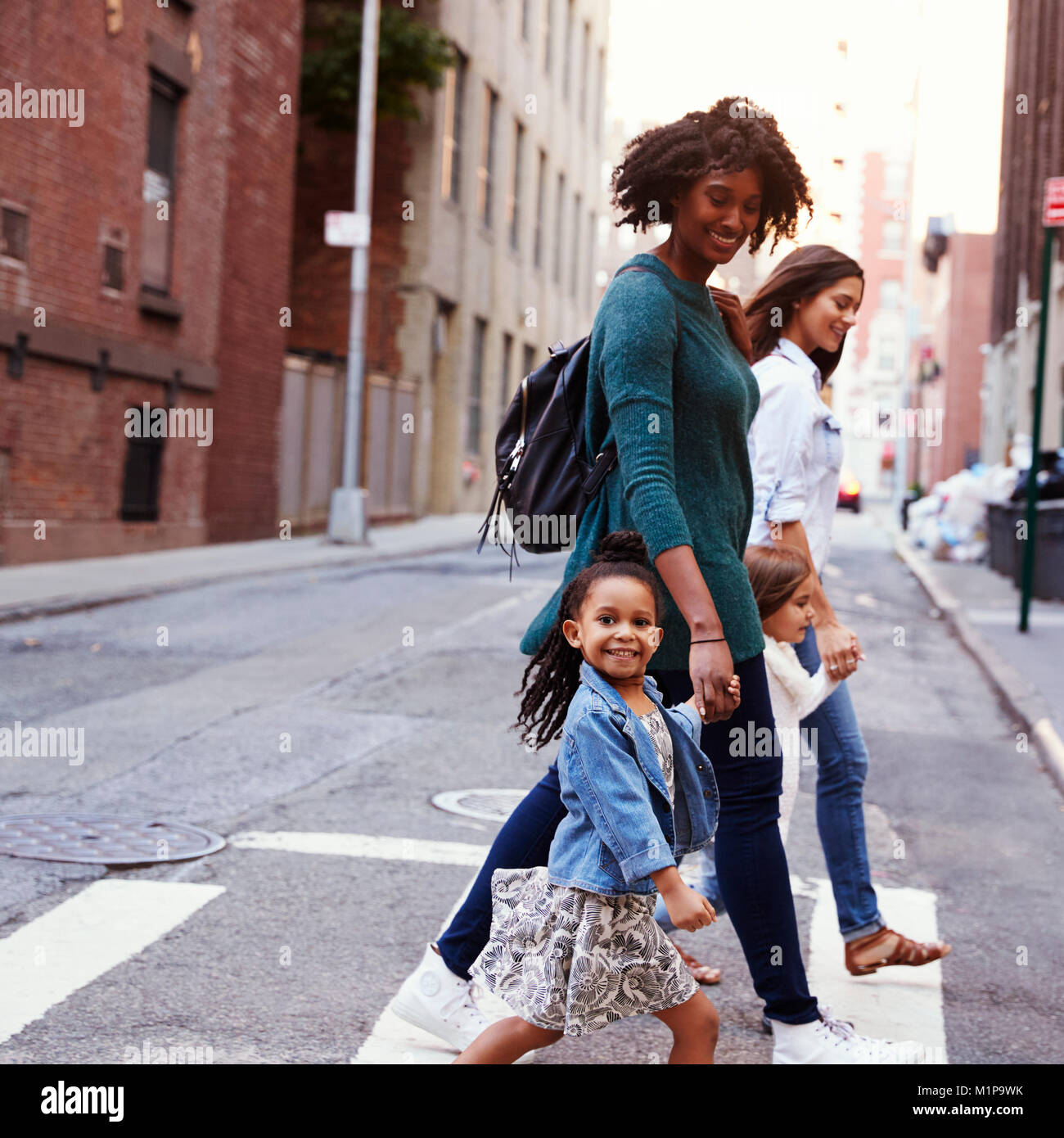Two Friends Crossing The Street High Resolution Stock Photography and ...