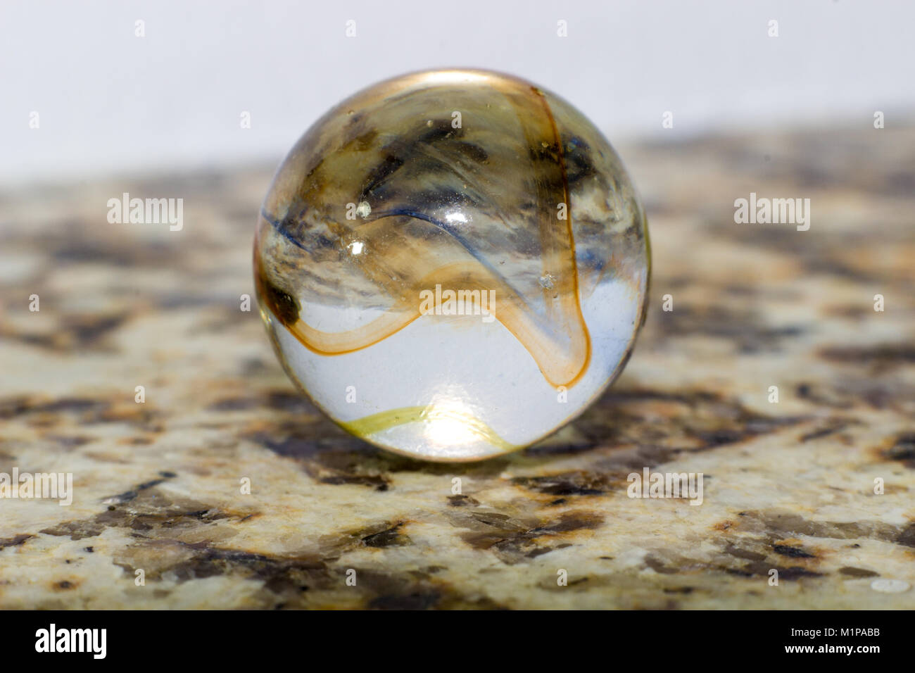 Macro of a glass marble Stock Photo - Alamy
