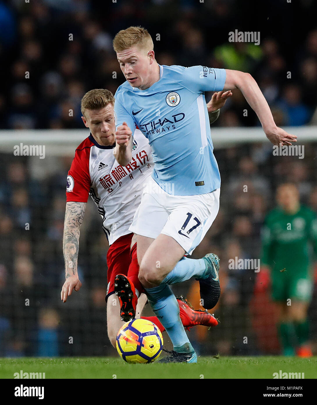 West Bromwich Albion's James McClean (left) challenges Manchester City ...