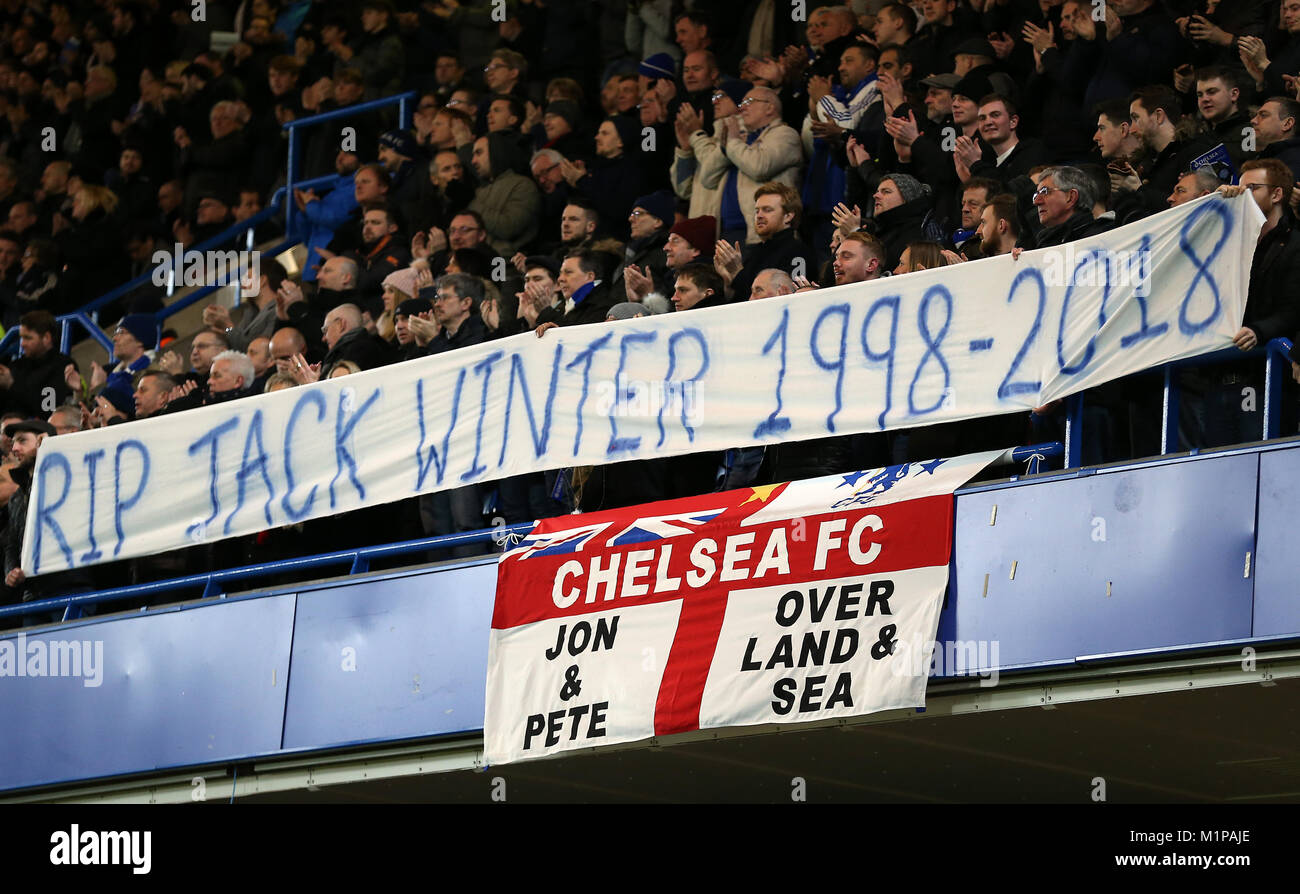 Fans hold up a banner in the stands during the Premier League match at ...