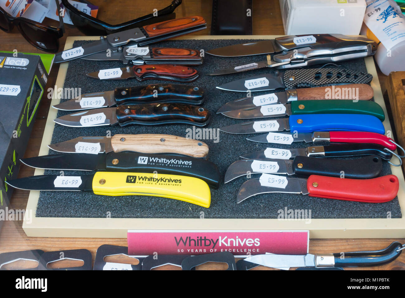A shop window display of Whitby Knives for crafts, gardening, and ...