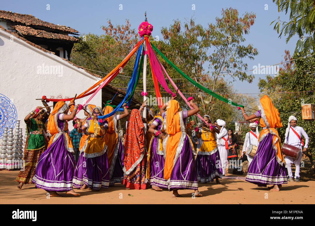 Dancing Dandiya Folk Dance of Gujarat, Udaipur, Rajasthan, India Stock ...