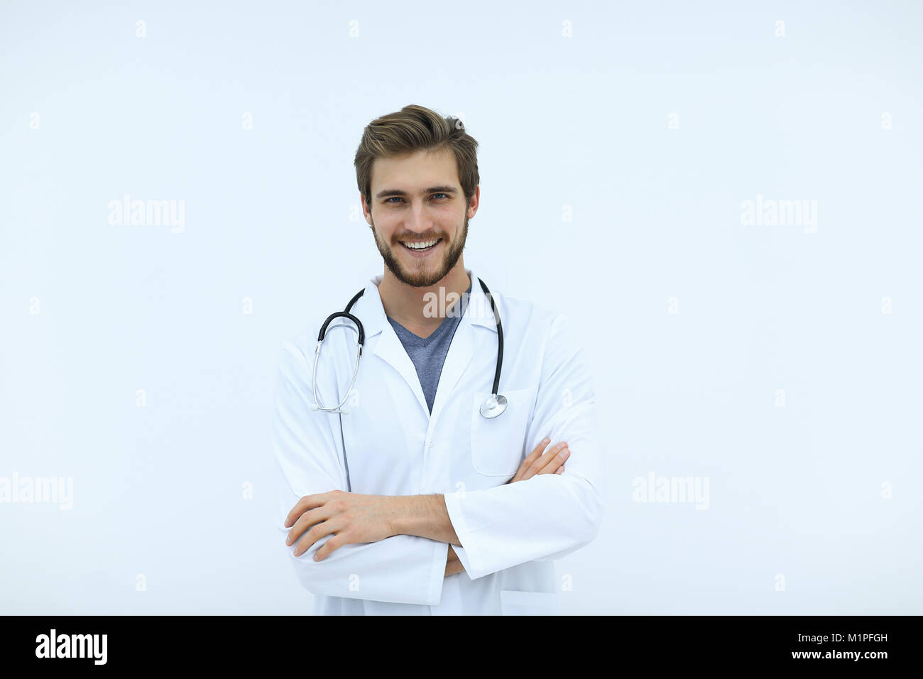 portrait of a friendly doctor.isolated on white Stock Photo - Alamy