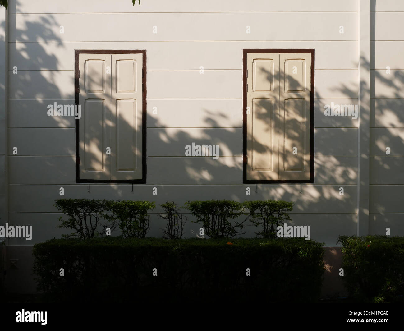 beige wood window of vintage retro style building Stock Photo - Alamy