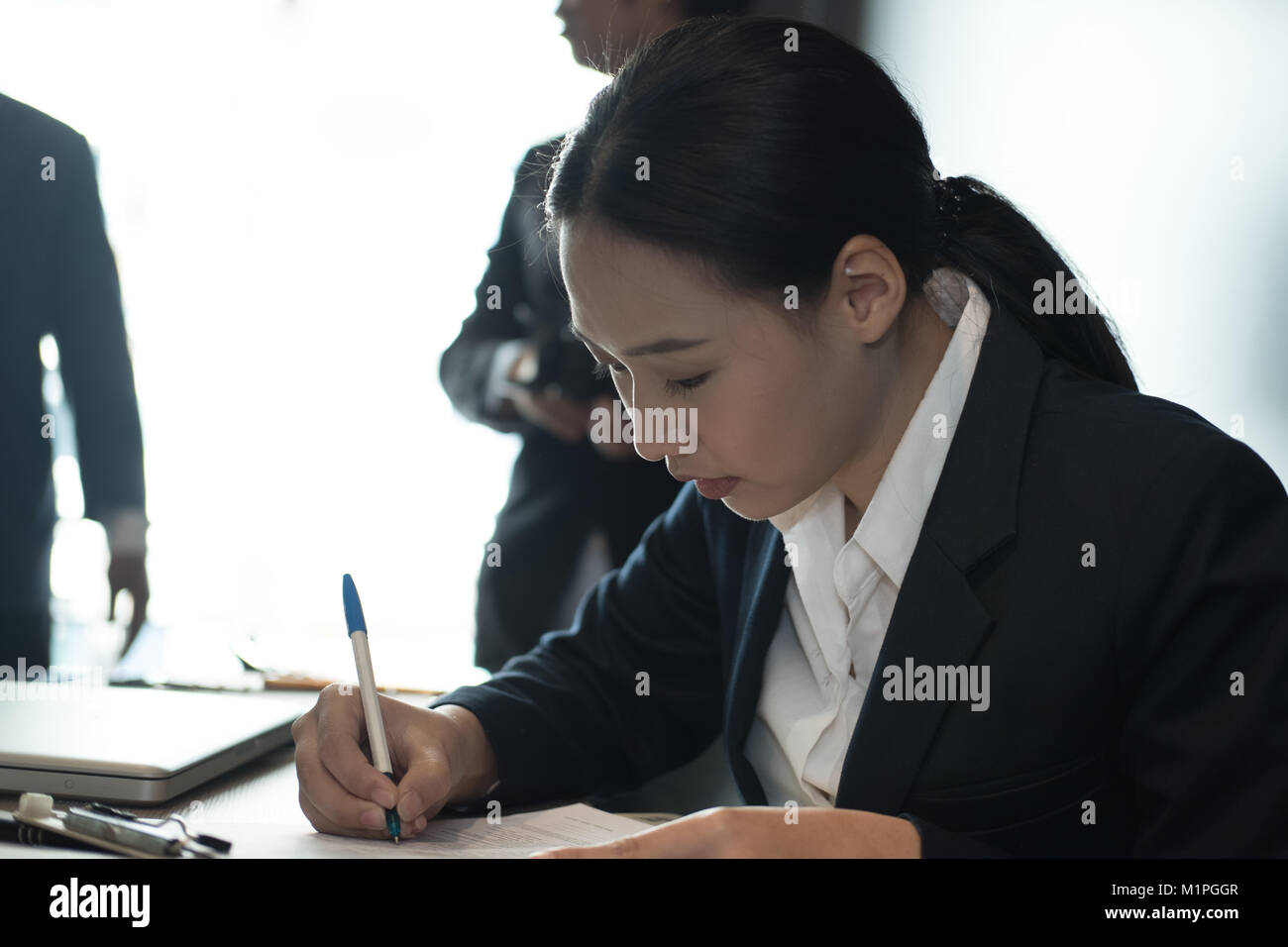 businesswoman sign business contract agreement. woman write on paper at ...