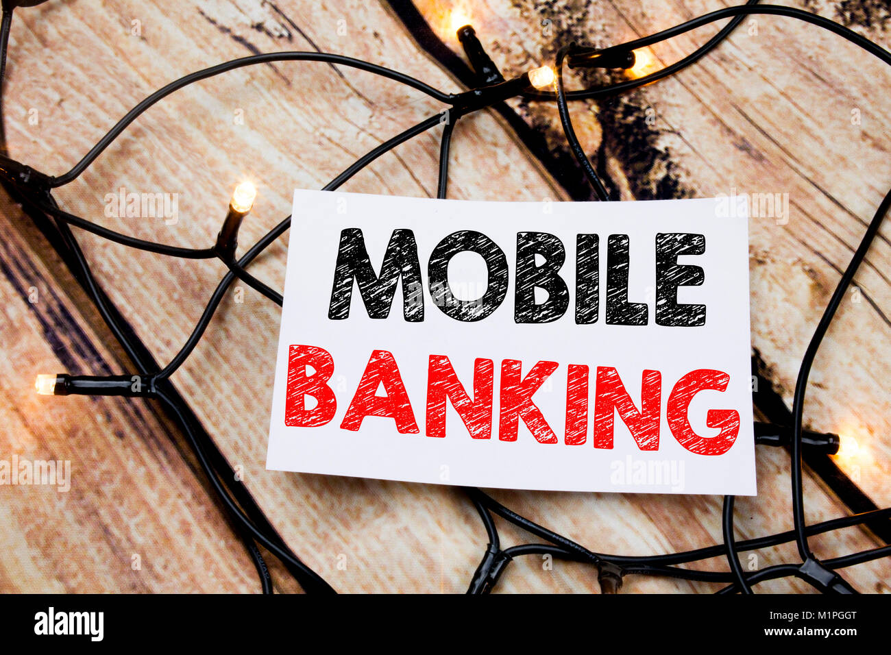 Handwritten text caption showing Mobile Banking. Business concept ...