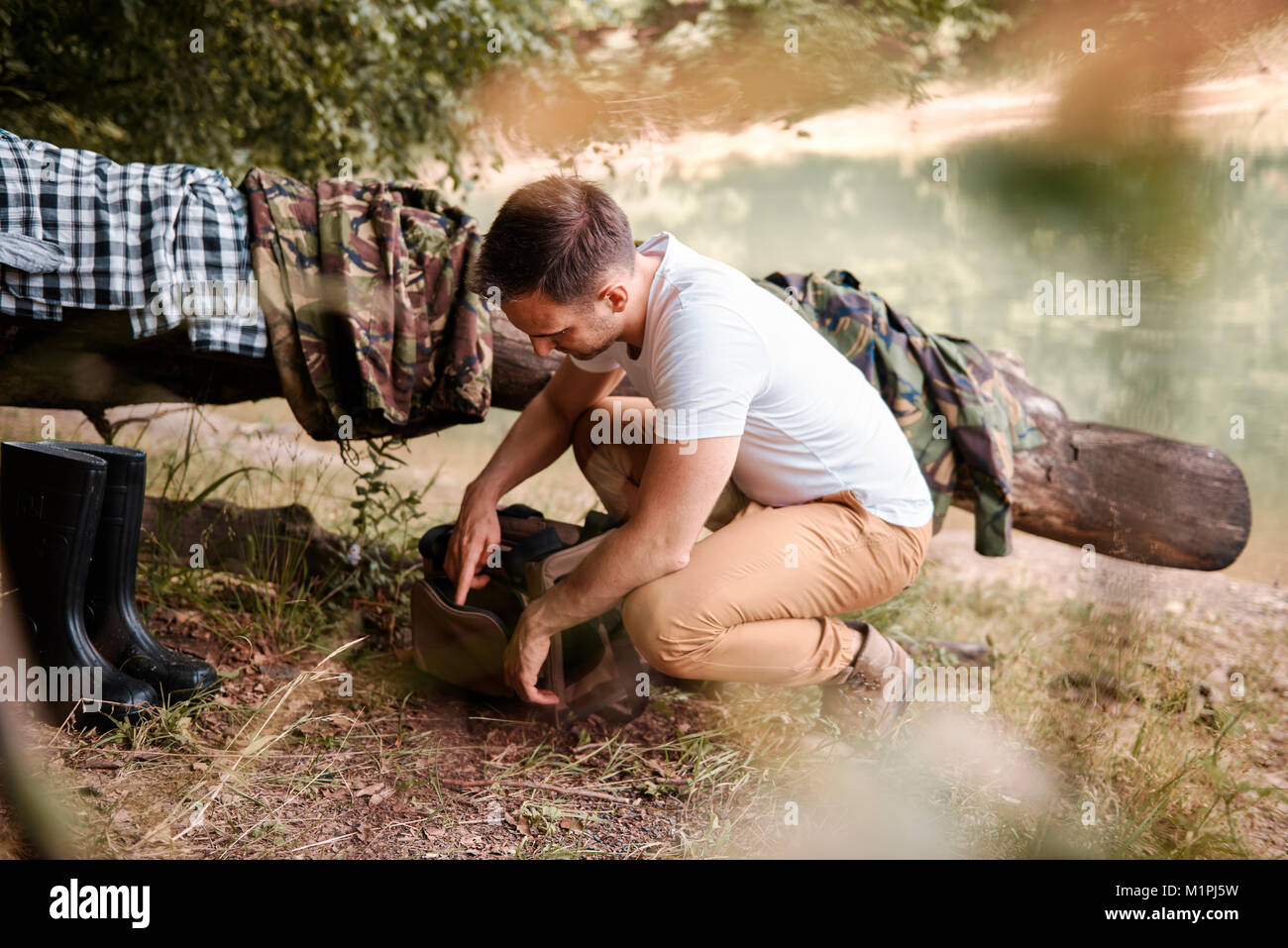 Man escaping into the wilderness Stock Photo - Alamy