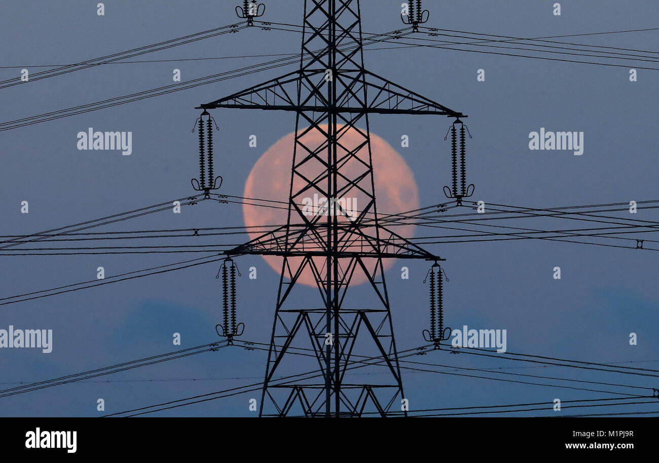 Visible through electricity pylons hi-res stock photography and images ...