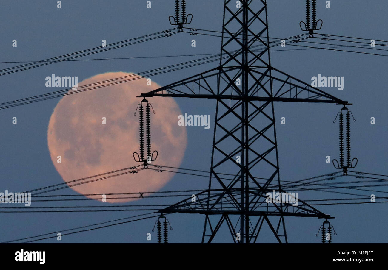 Electricity pylons full moon hi-res stock photography and images - Alamy