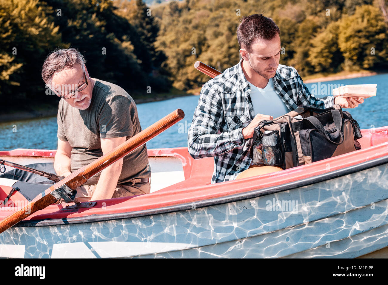 Sitting down fishing hi-res stock photography and images - Alamy