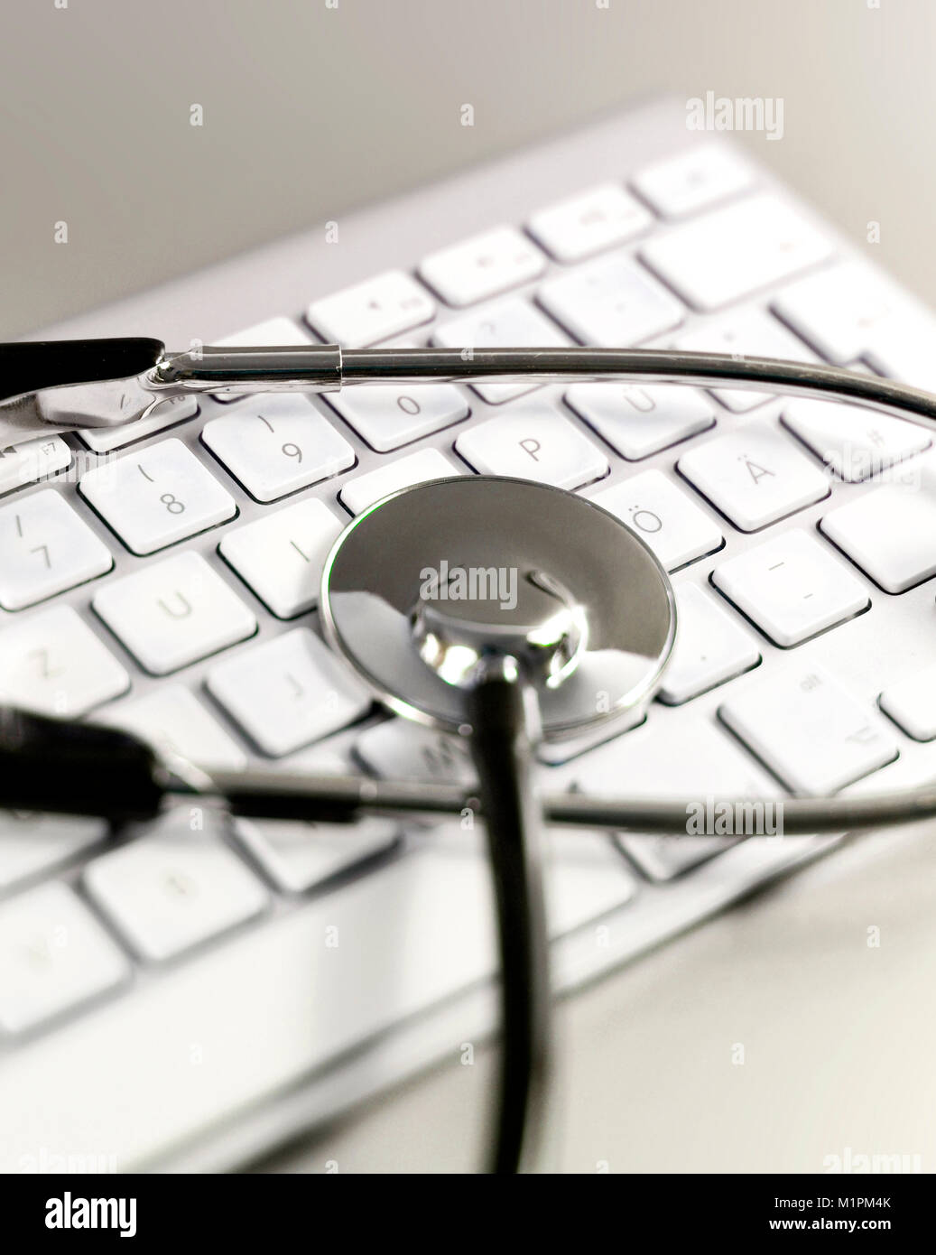 It support scene with stethoscope and computer keypad. Medical ...