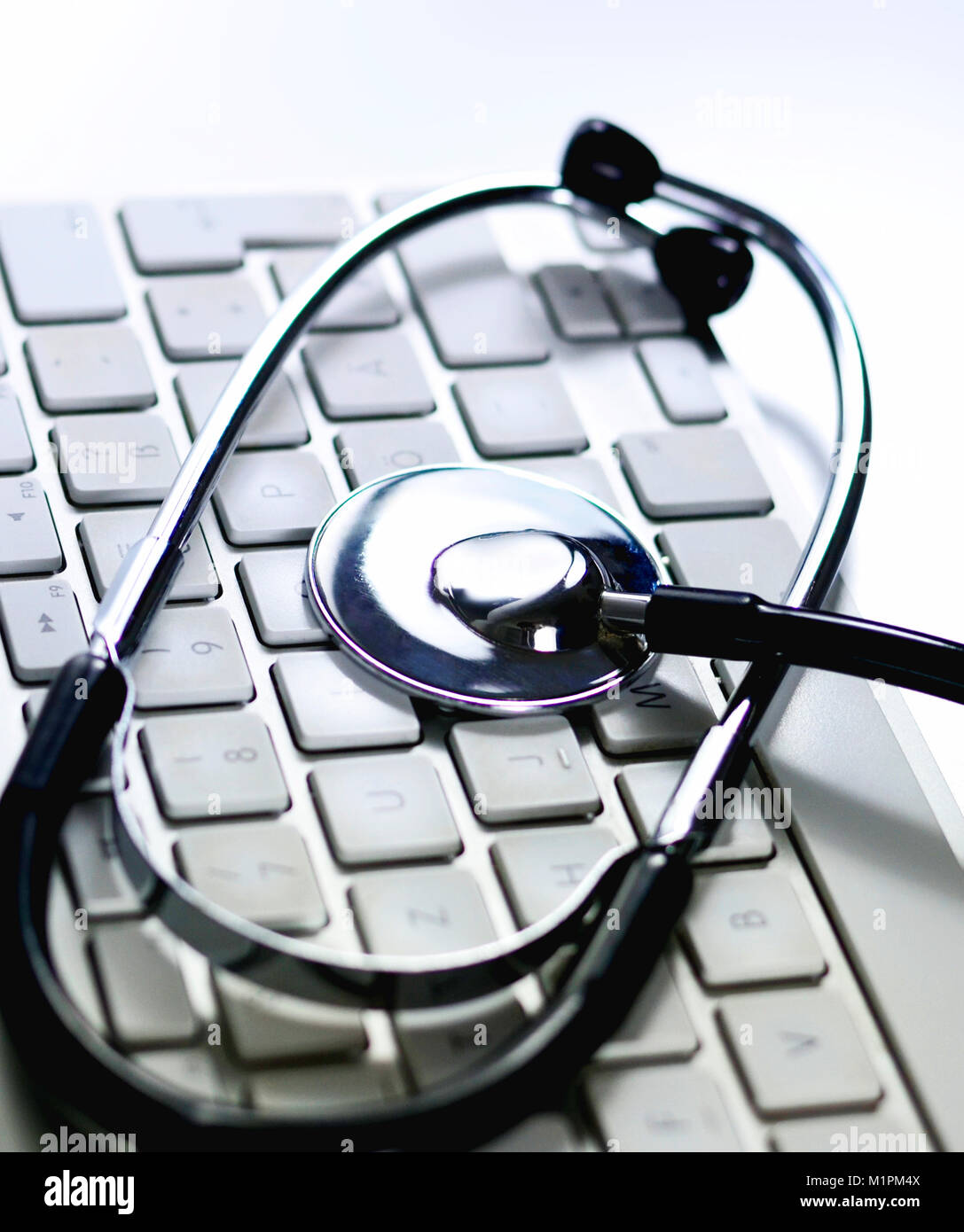 It support scene with stethoscope and computer keypad. Medical ...