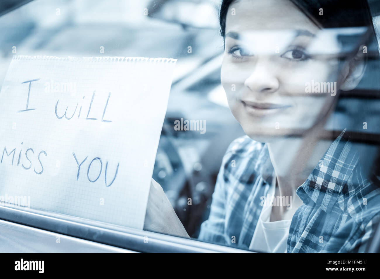Beautiful lady going to miss her dearest while leaving Stock Photo - Alamy