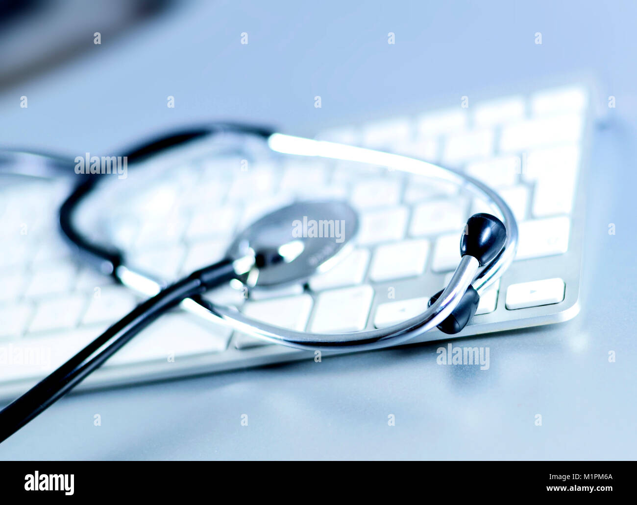 It support scene with stethoscope and computer keypad. Medical ...
