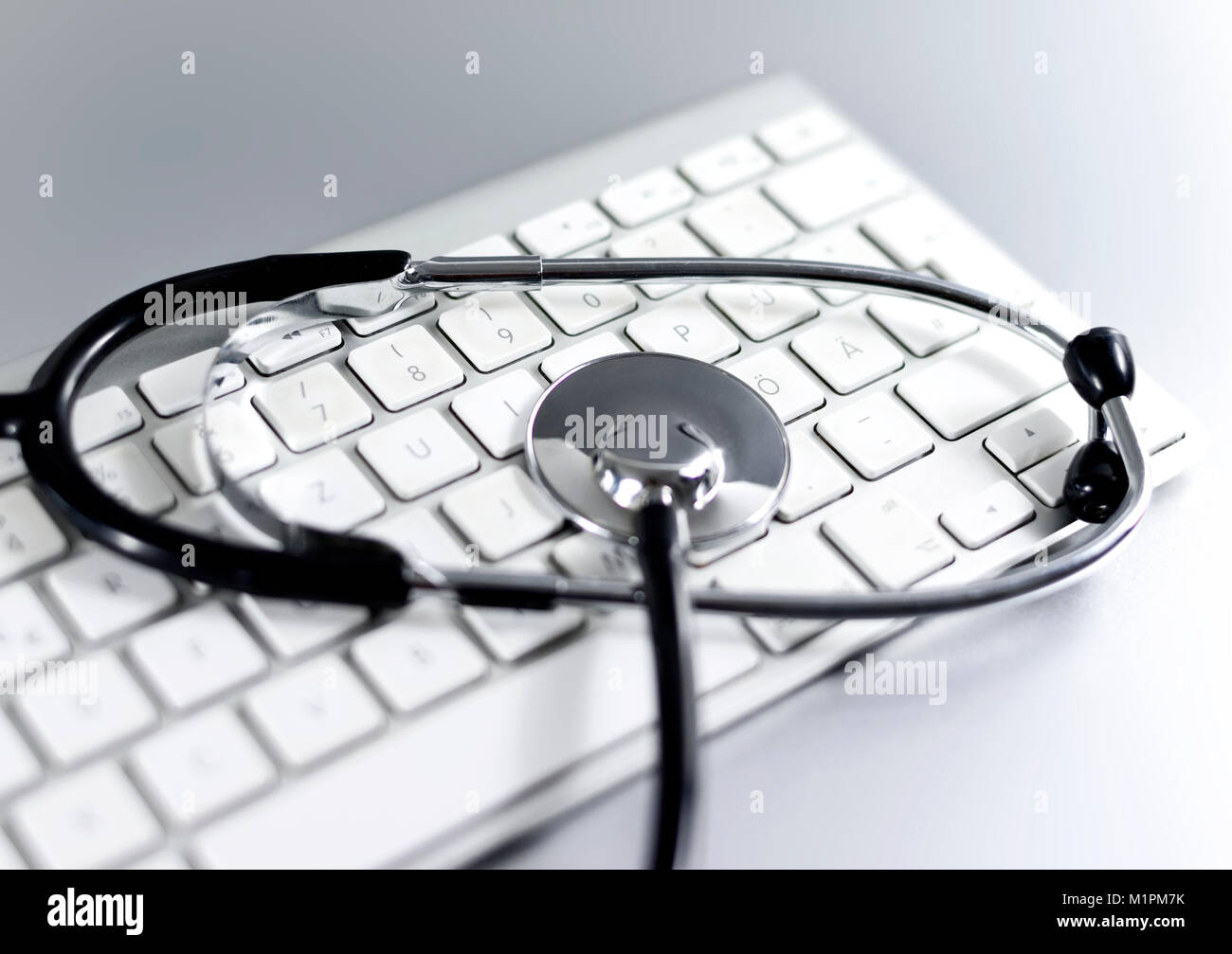 It support scene with stethoscope and computer keypad. Medical ...
