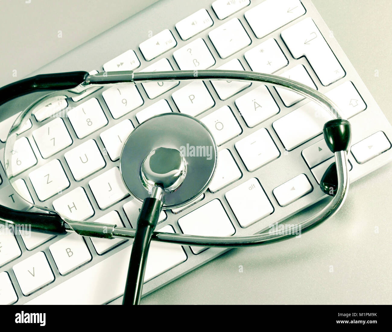 It support scene with stethoscope and computer keypad. Medical ...