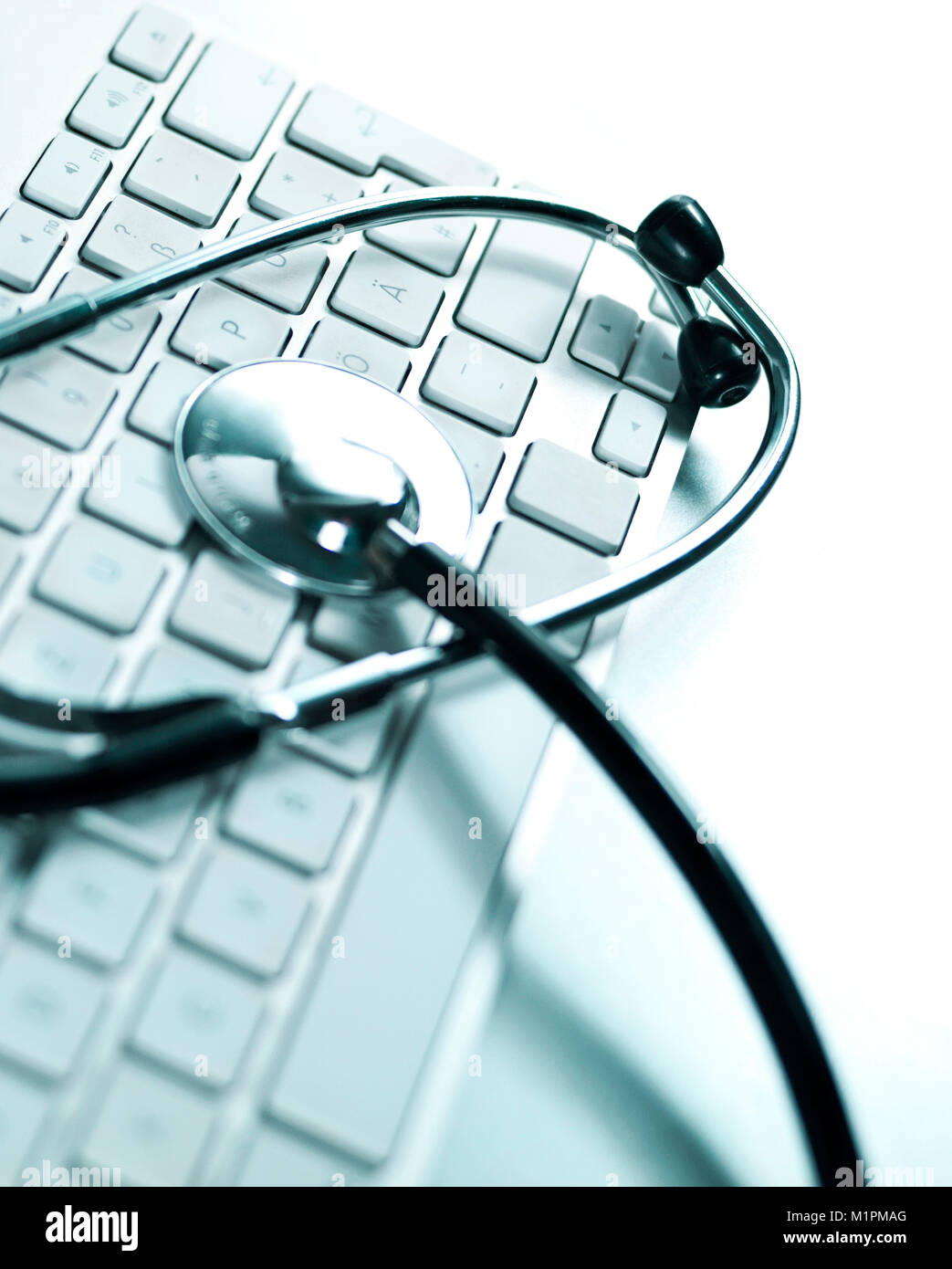 It support scene with stethoscope and computer keypad. Medical ...