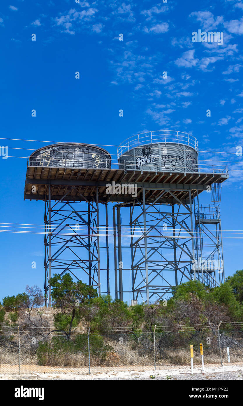 Water tanks on raised platforms Stock Photo - Alamy