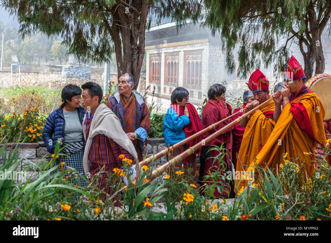 Bumthang, Bhutan. Monks Playing Trumpets (Dung-chen) Entering Jambay ...