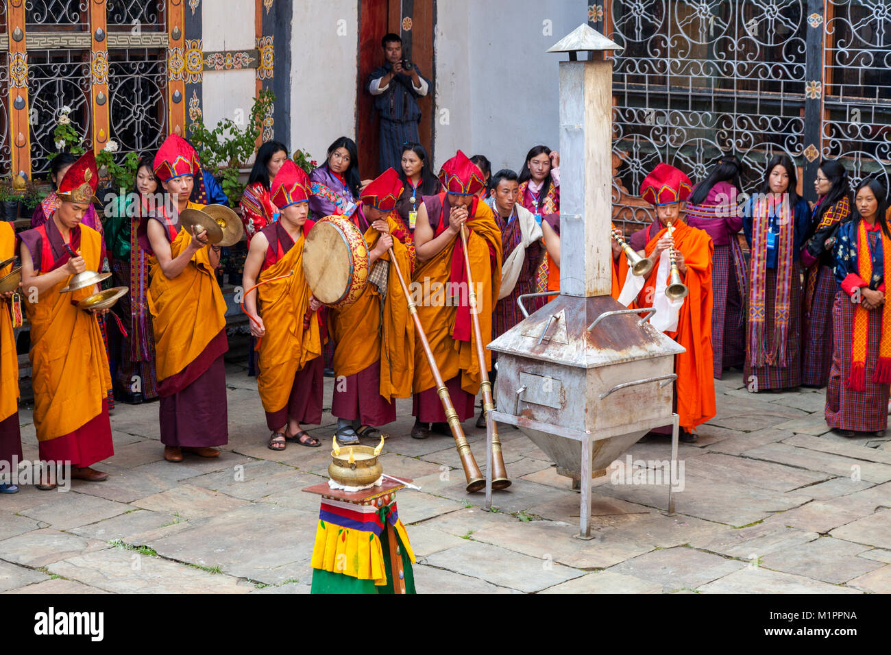 Bumthang, Bhutan. Buddhist Monks in Religious Ceremony in Courtyard of ...
