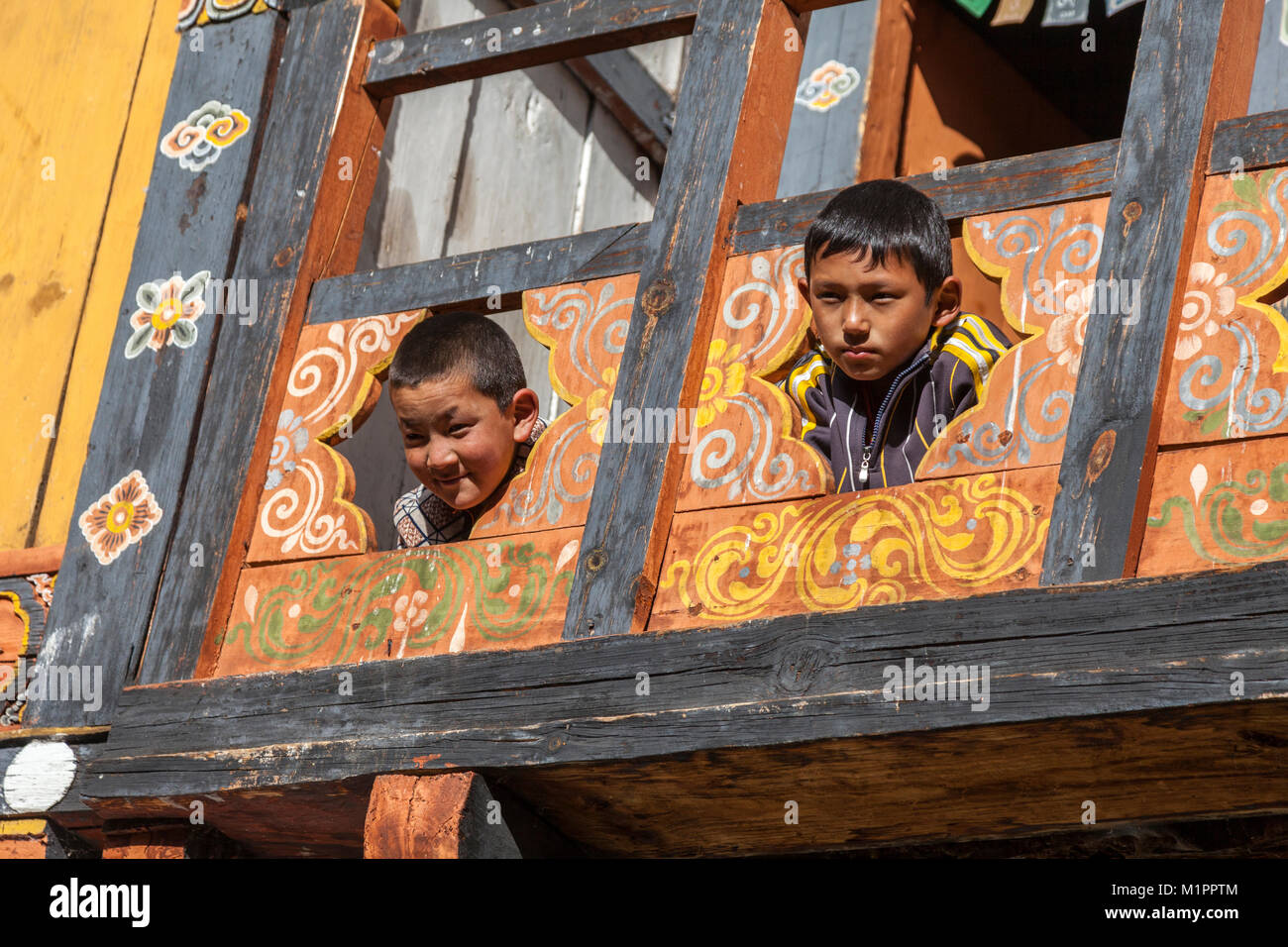 Bumthang, Bhutan. Young Boys Watching Monks Performing a Religious ...