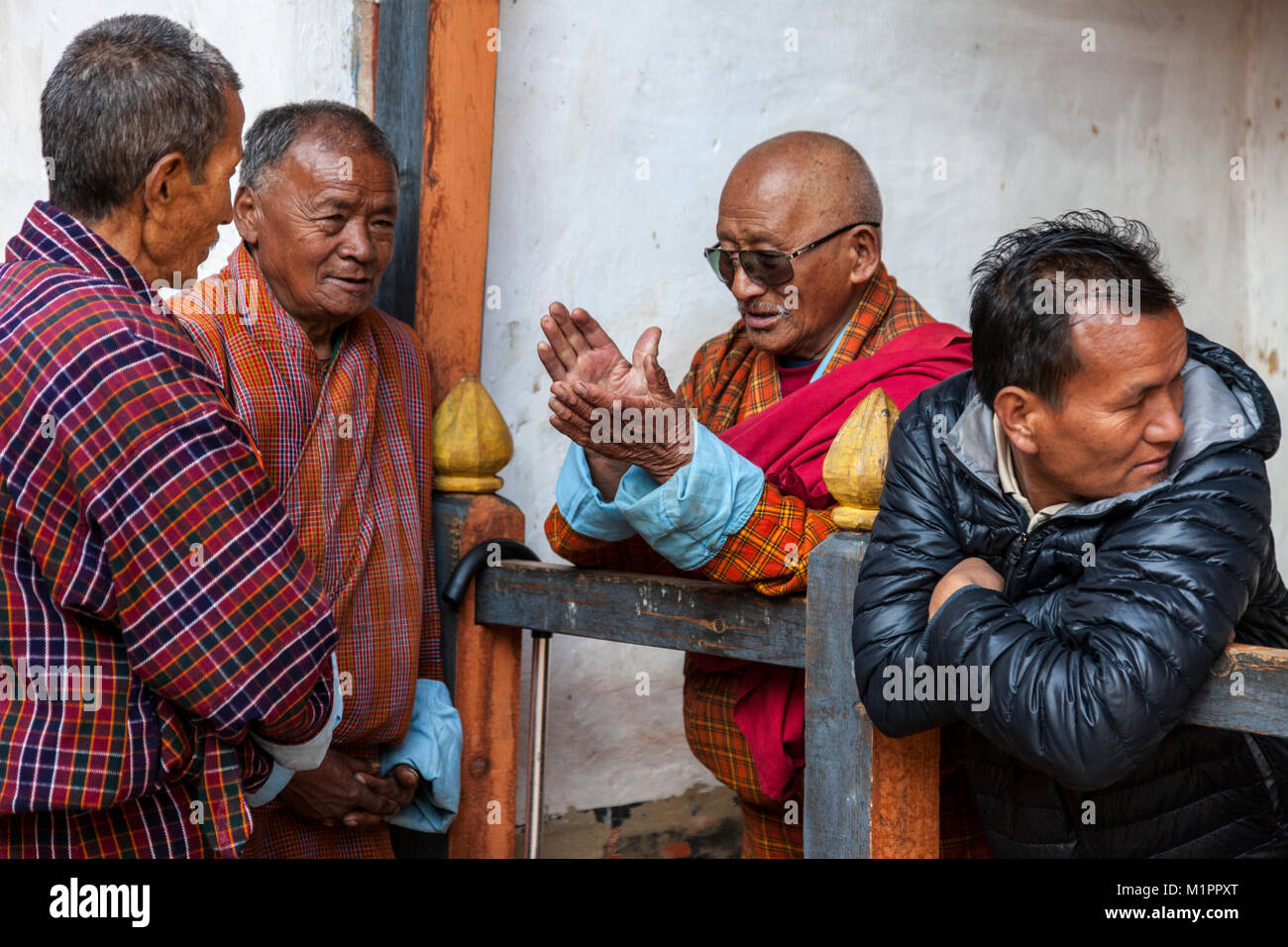 Bumthang, Bhutan. Old Men Talking, Three Wearing Traditional Gho ...