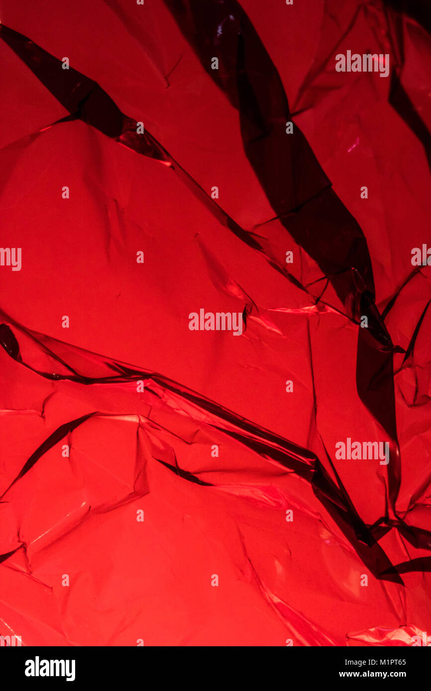 Plastic Shiny See Through Abstract Shimmer Creased Background red Stock ...