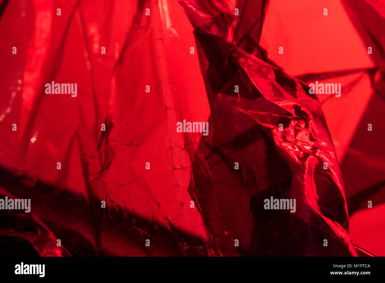 Plastic Shiny See Through Abstract Shimmer Creased Background red Stock ...