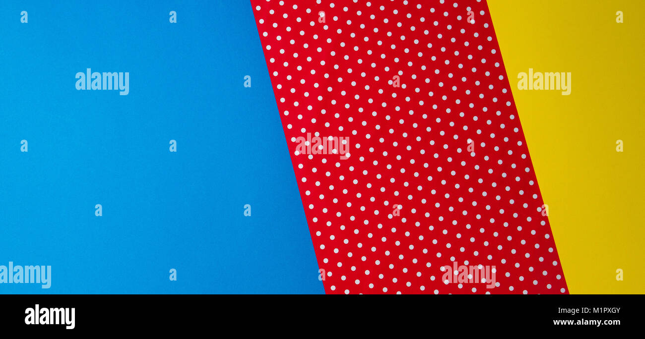 Abstract geometric blue, yellow and red polka dot paper background ...