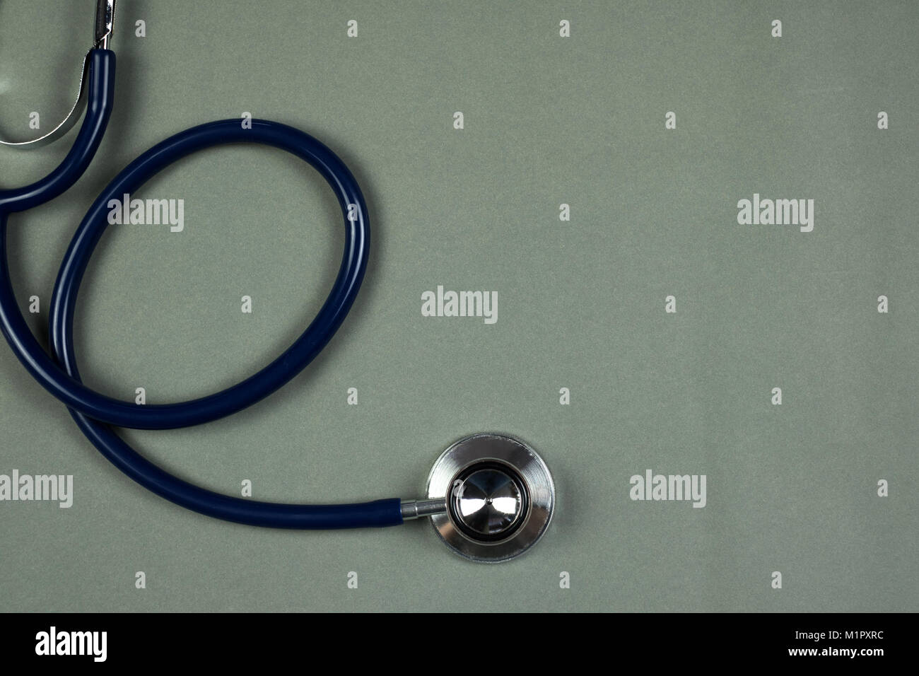 Stethoscope with blue tube on table top view with copy space. health ...
