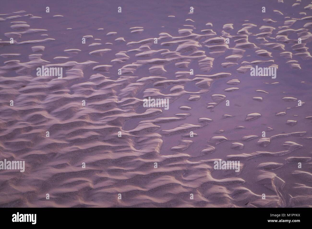 Patterns in sand, multi-coloured Stock Photo - Alamy