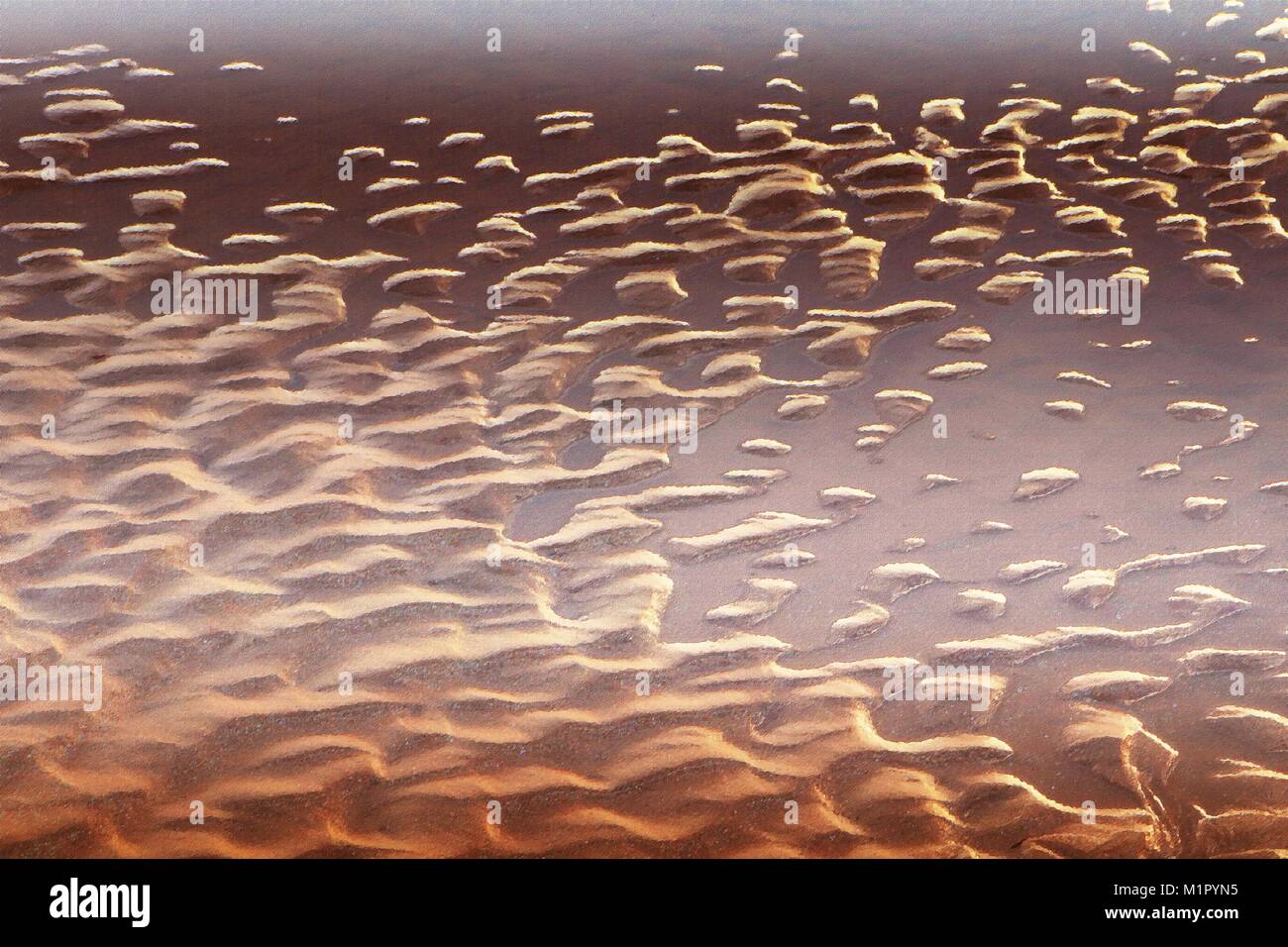 Patterns in sand, multi-coloured Stock Photo - Alamy