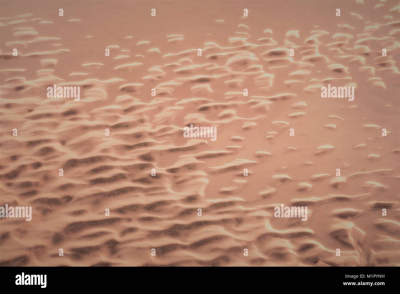 Patterns in sand, multi-coloured Stock Photo - Alamy