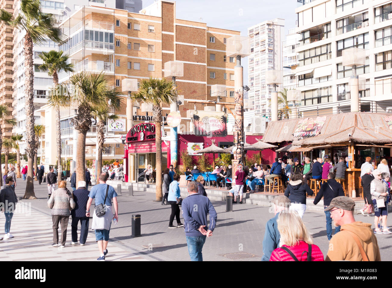 People walking on the embankment street in Benidorm, Spain Stock Photo ...