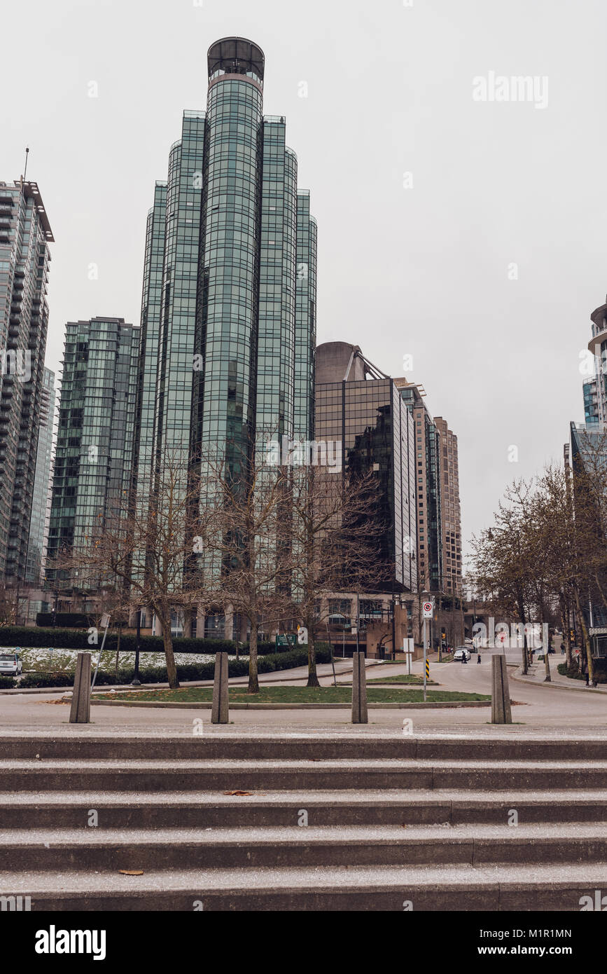 Empty park in downtown with skyscrapers in Vancouver, British Columbia ...