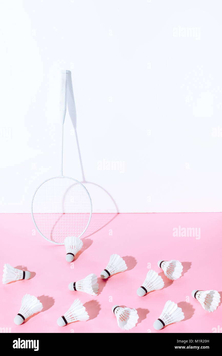 white badminton racket and shuttlecocks on pink Stock Photo - Alamy