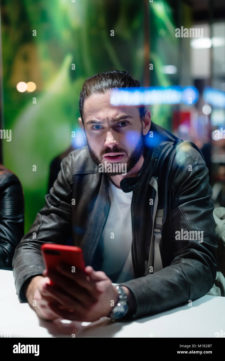 Male hand phone lights hi-res stock photography and images - Alamy