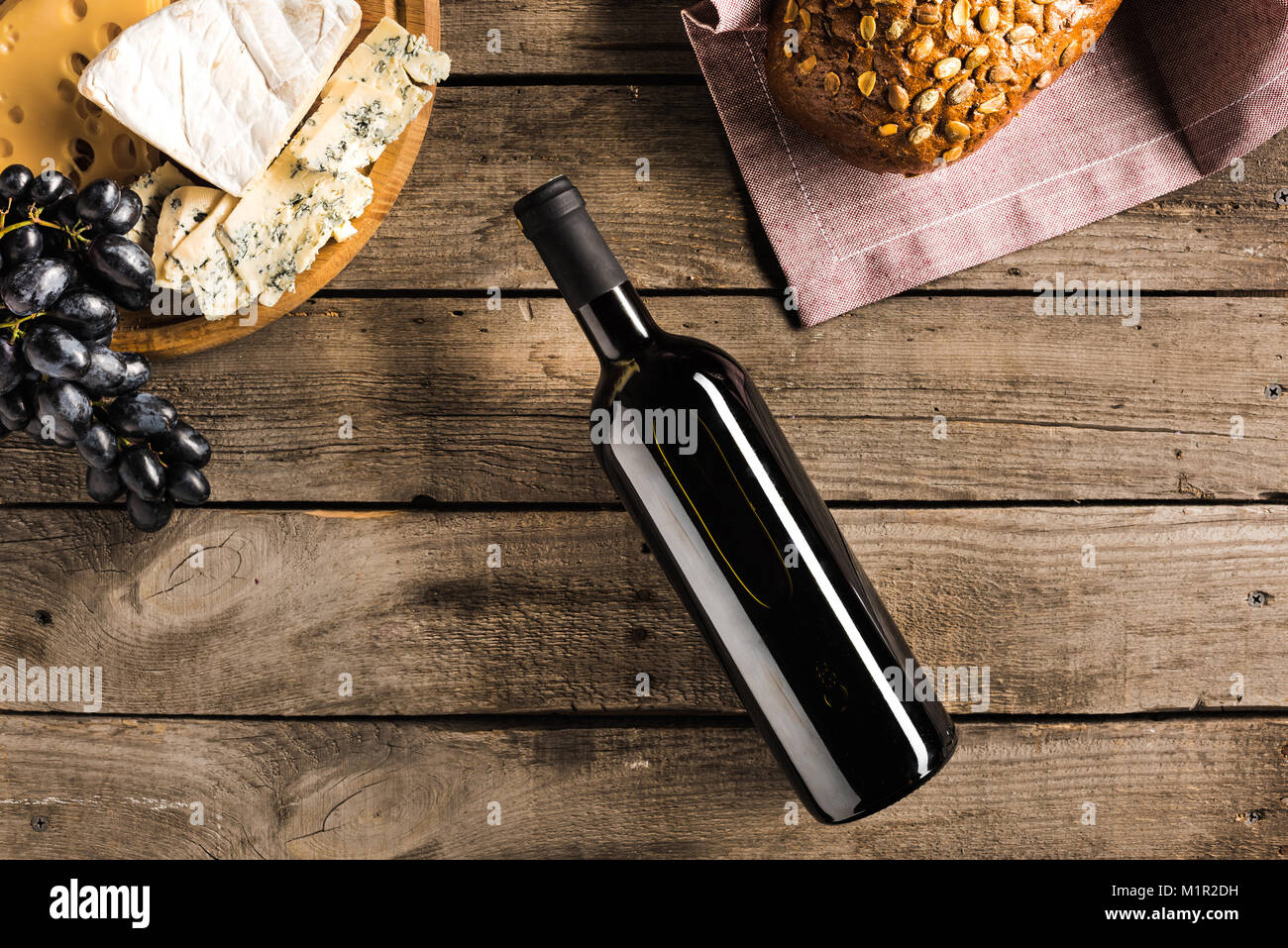 bottle of wine, bread and cheese Stock Photo - Alamy
