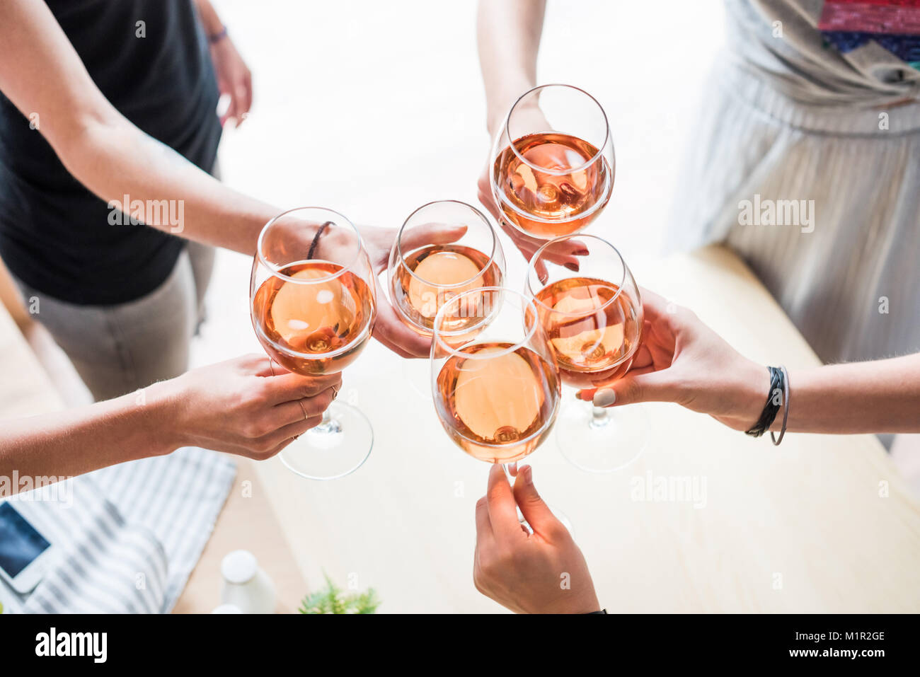 women clinking with wineglasses Stock Photo - Alamy