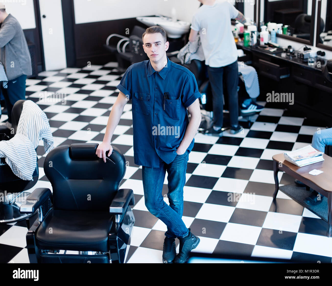 Man Standing On Chair High Resolution Stock Photography and Images - Alamy