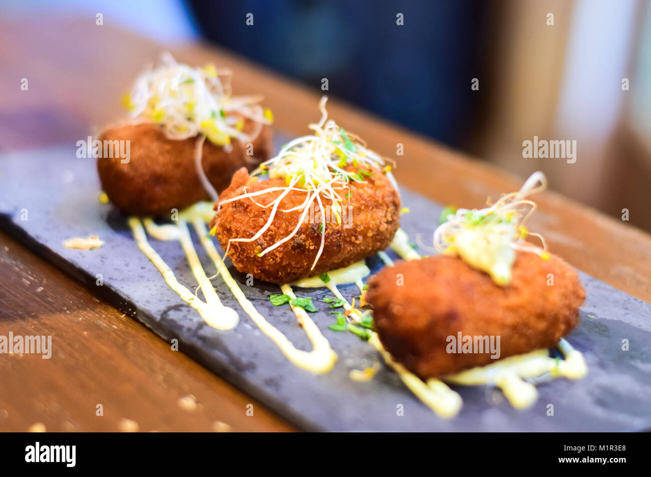 Tasty tapas in Seville restaurant Stock Photo - Alamy