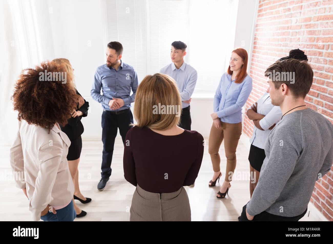 Manager With His Business Colleagues Having Discussion In The Office ...