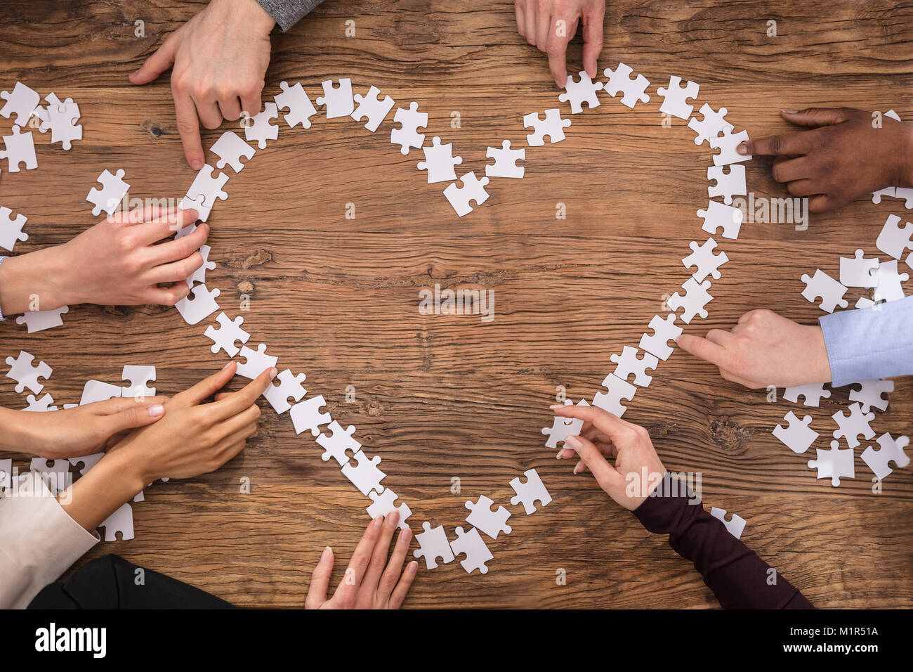 Large group people forming shape hi-res stock photography and images ...