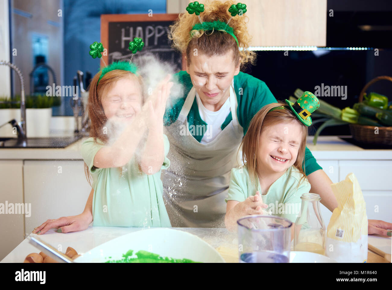 Playful kids having fun with the flour Stock Photo - Alamy