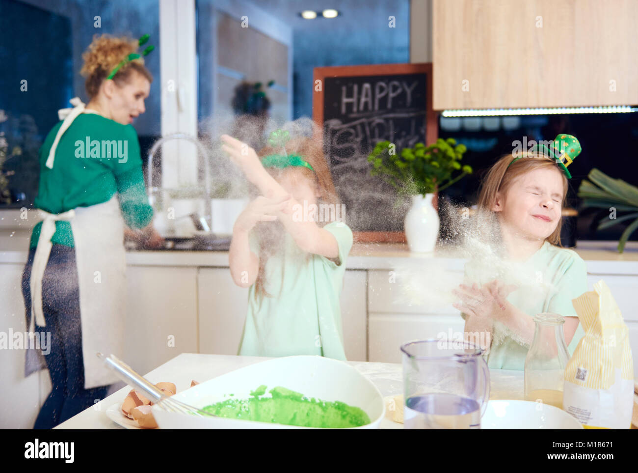 Playful kids enjoying with the flour Stock Photo - Alamy