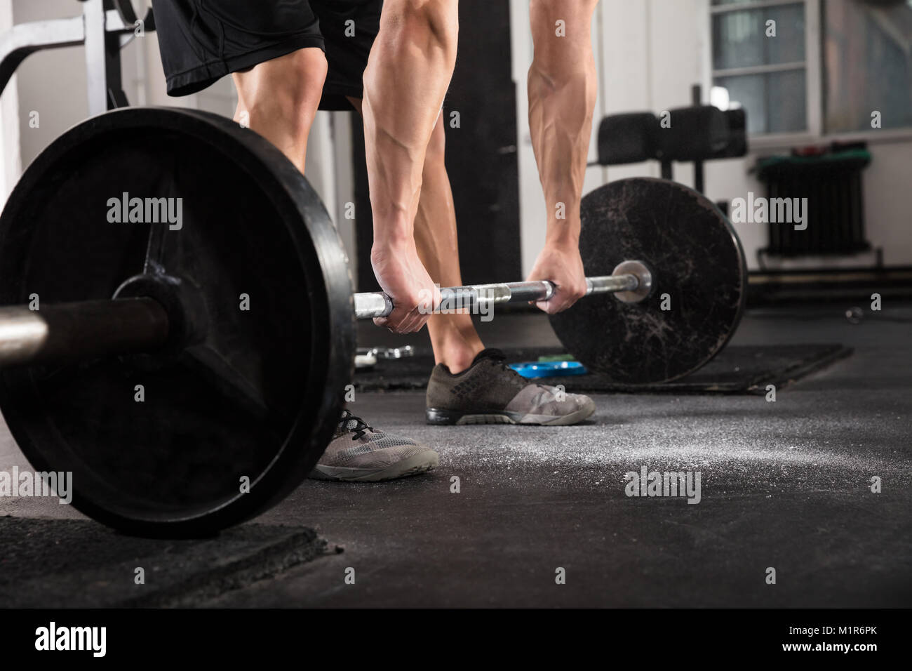 Person lifting heavy object hi-res stock photography and images - Alamy