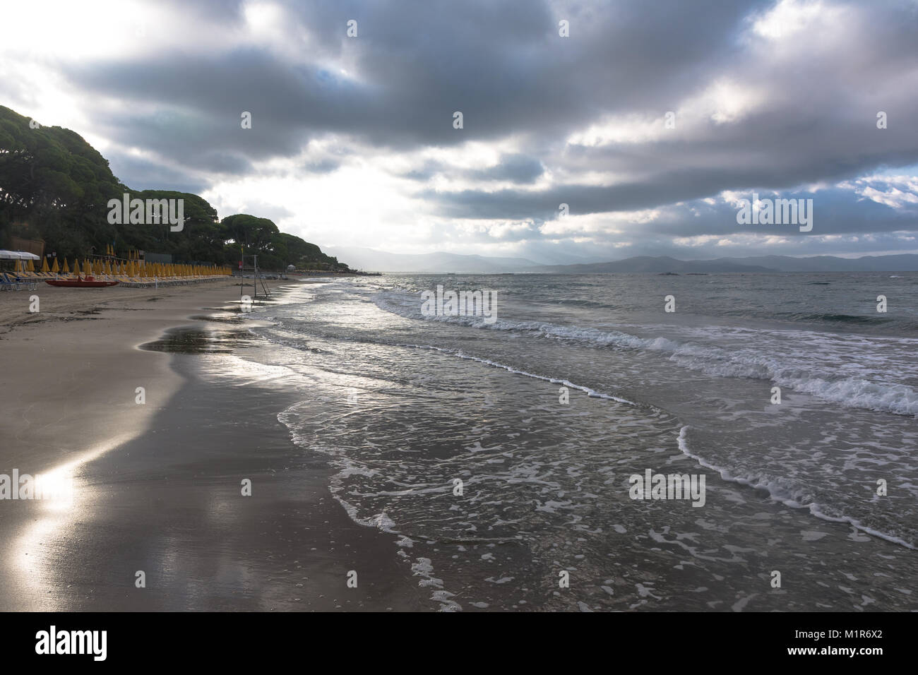 Sunrise on the beach, Follonica, Tuscany, Italy Stock Photo - Alamy