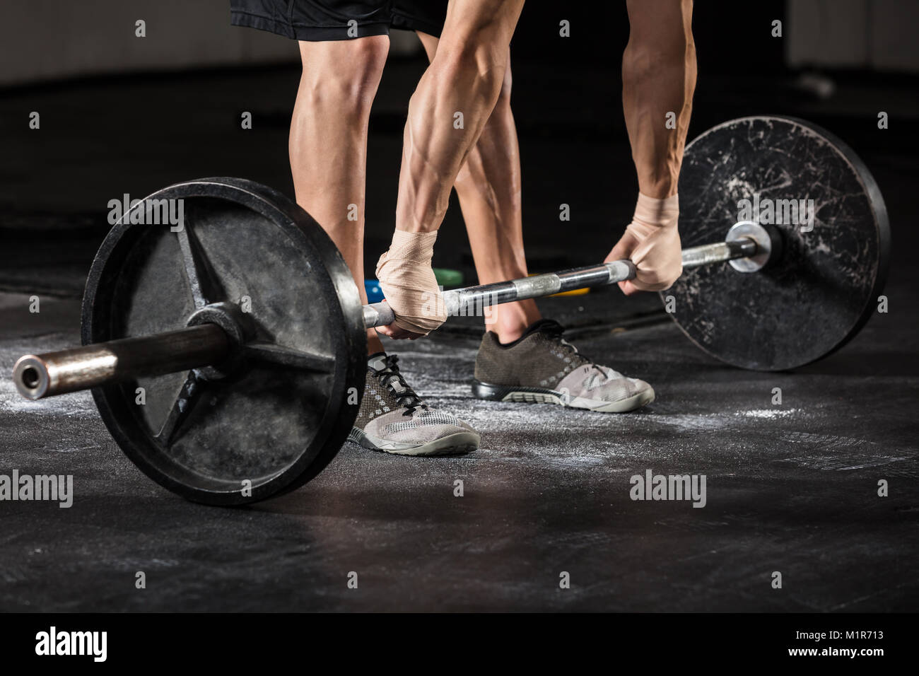 Close-up Of A Person Lifting Barbell In The Gym Stock Photo - Alamy